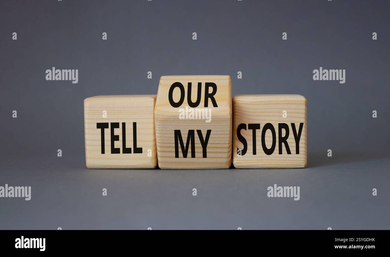 Tell our or my story symbol. Turned wooden cubes with words Tell my ...