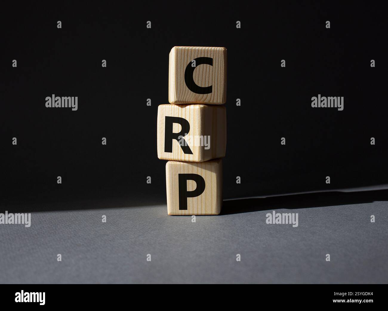 CRP - C-Reactive Protein Test symbol. Wooden cubes with word CRP ...