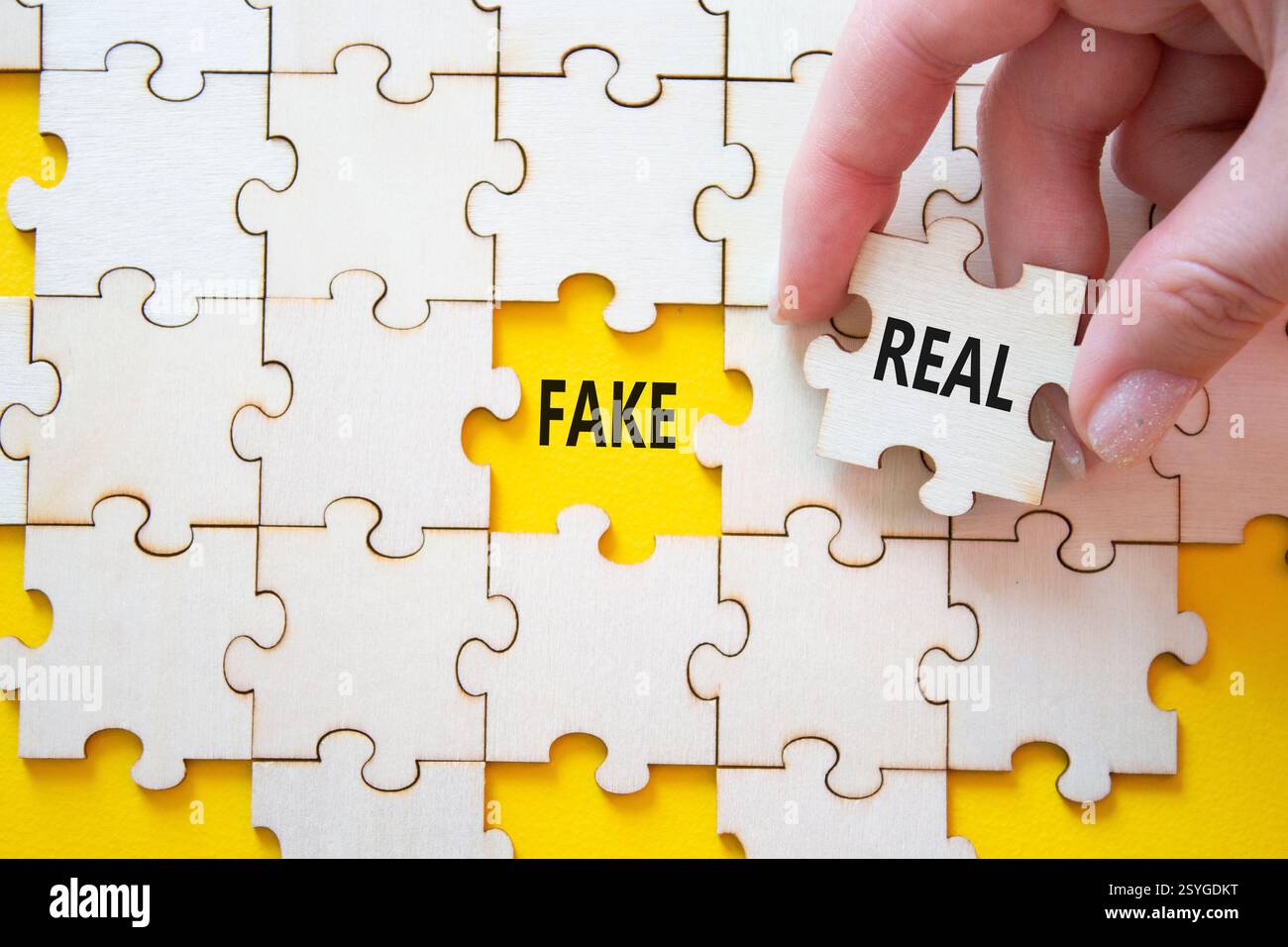 Real or Fake symbol. Concept word Real or Fake on wooden blocks ...