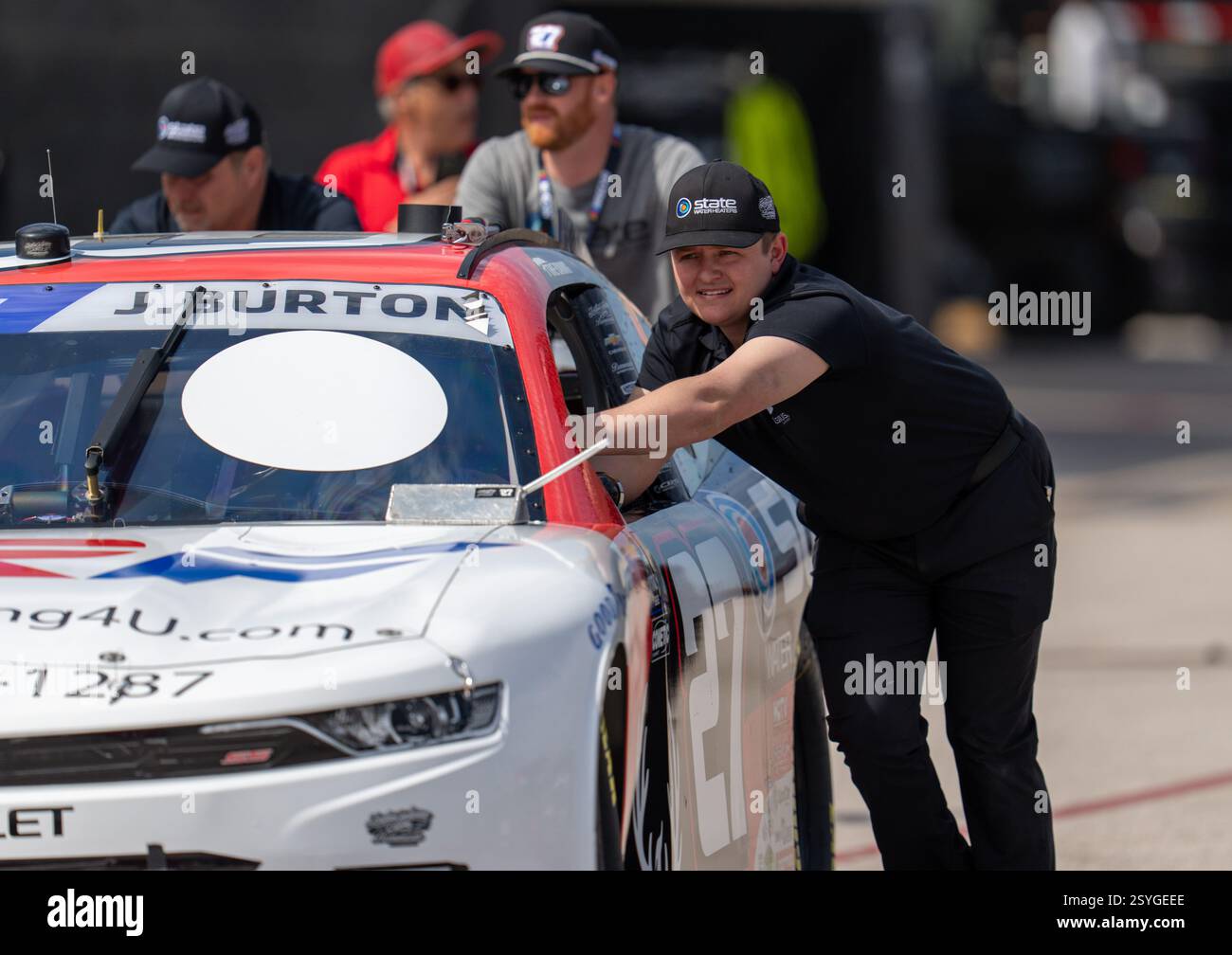 February 28, 2025, Austin, Texas, USA: A member of the crew of NASCAR ...