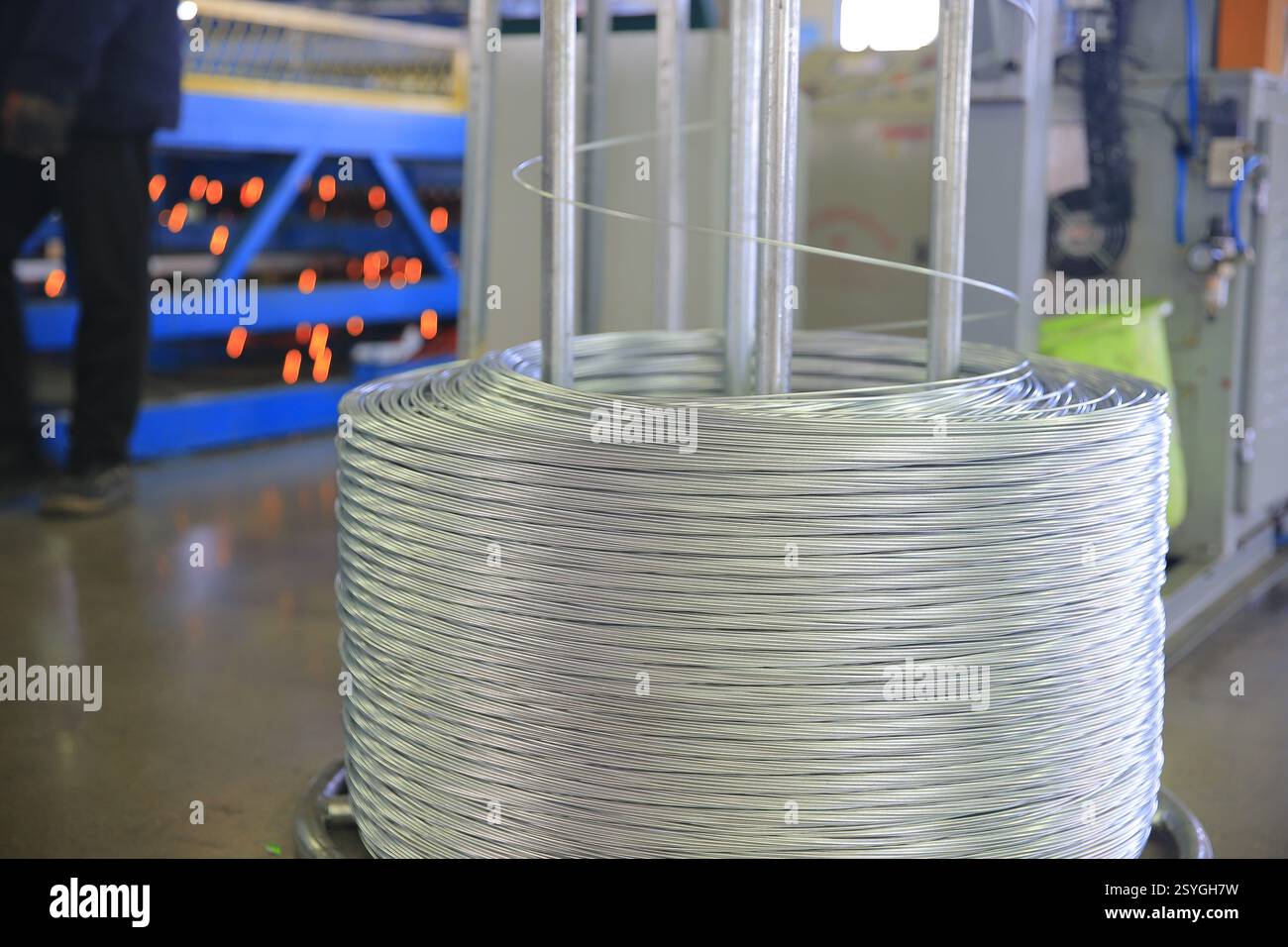 Fine wire mesh in the production workshop, modern industry Stock Photo ...