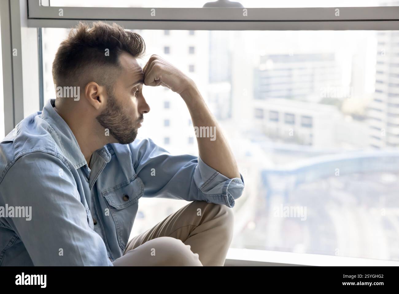 Man looks bored on split hi-res stock photography and images - Alamy