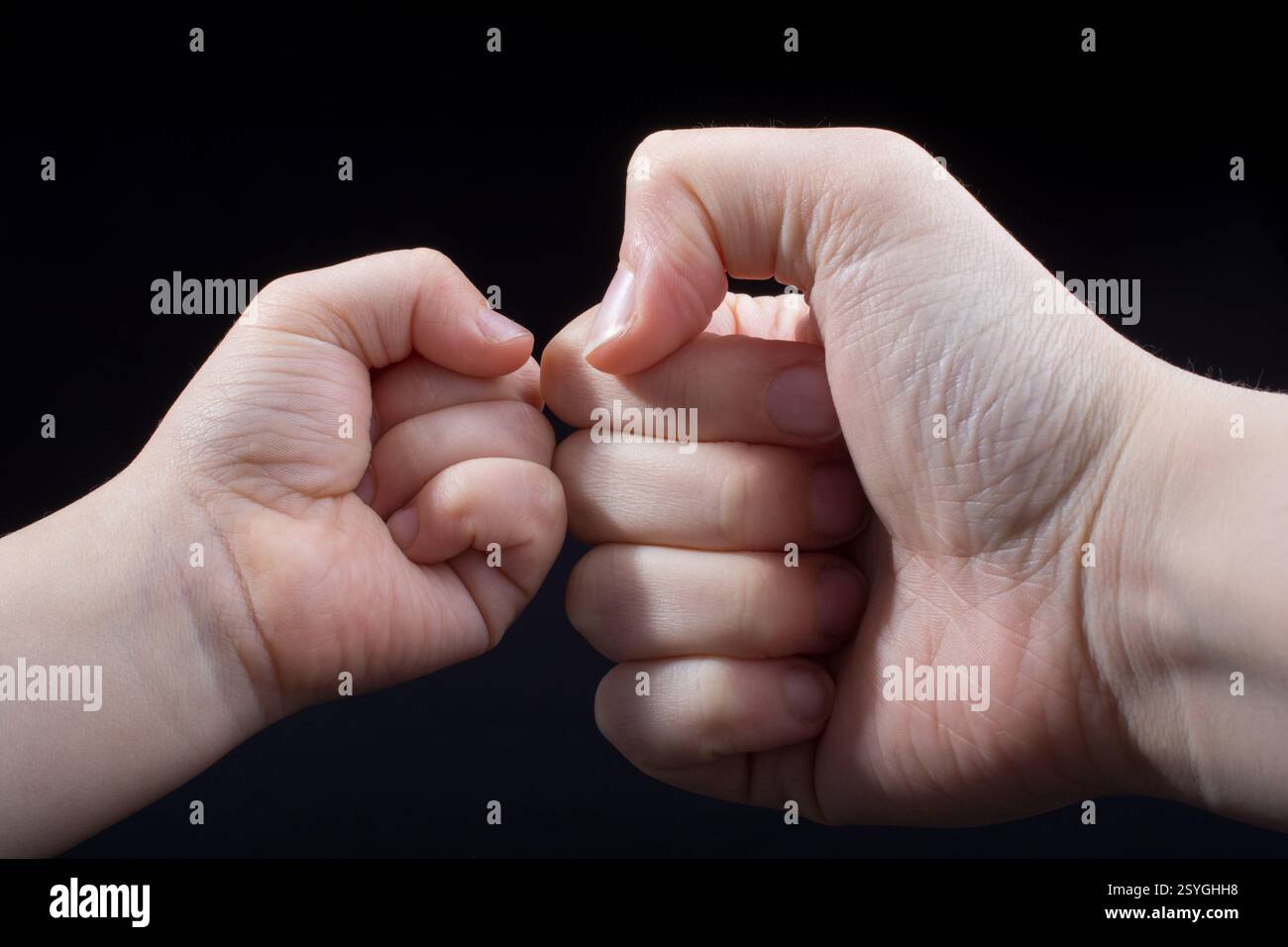 Hand closed for a fist gesture in black Stock Photo - Alamy