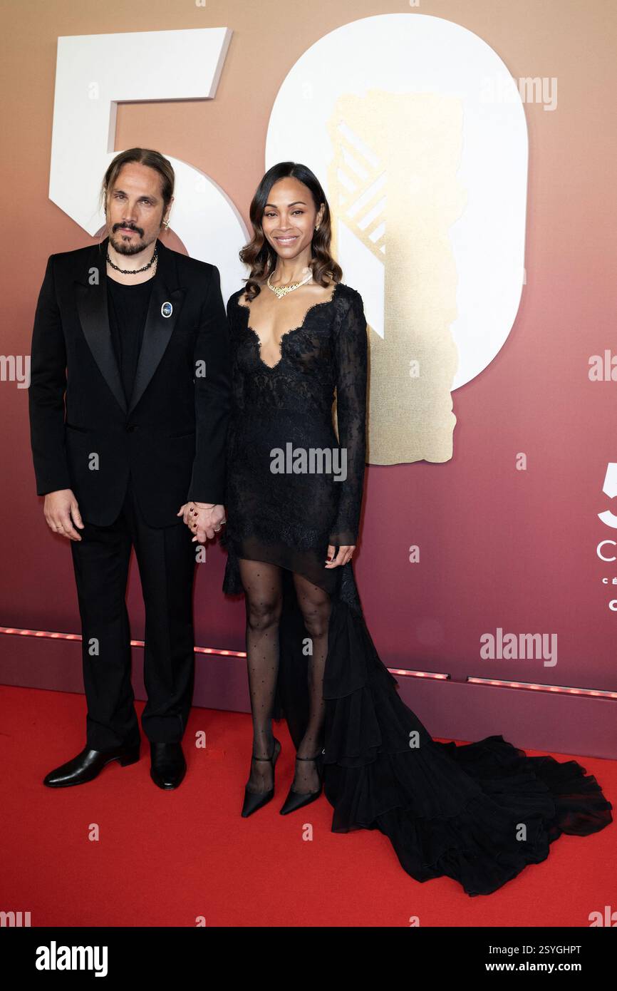 Paris, France. 28th Feb, 2025. Marco Perego and Zoe Saldana arrive at ...