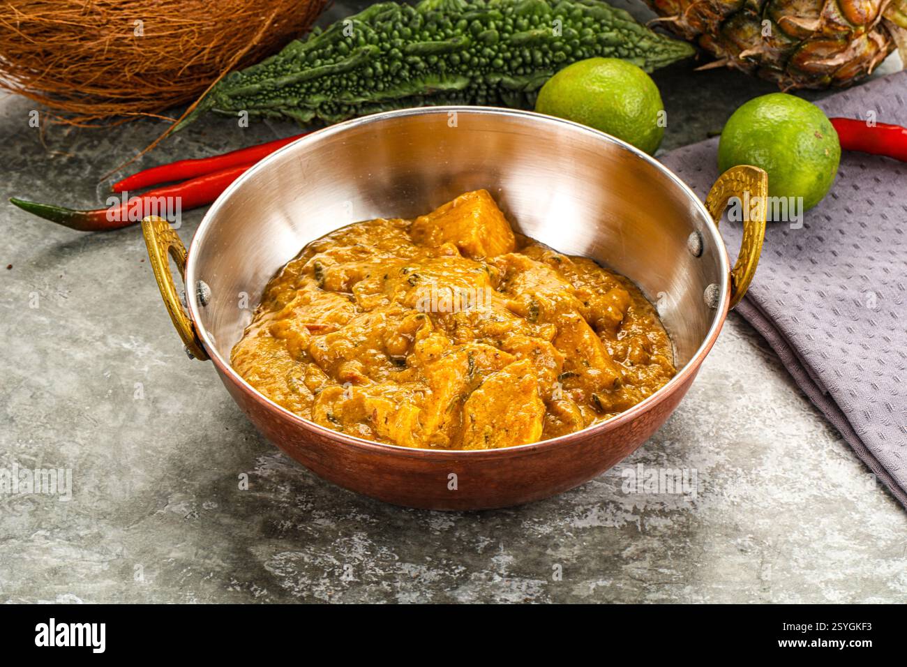 Indian cuisne - Chicken massala with sauce and spices Stock Photo - Alamy