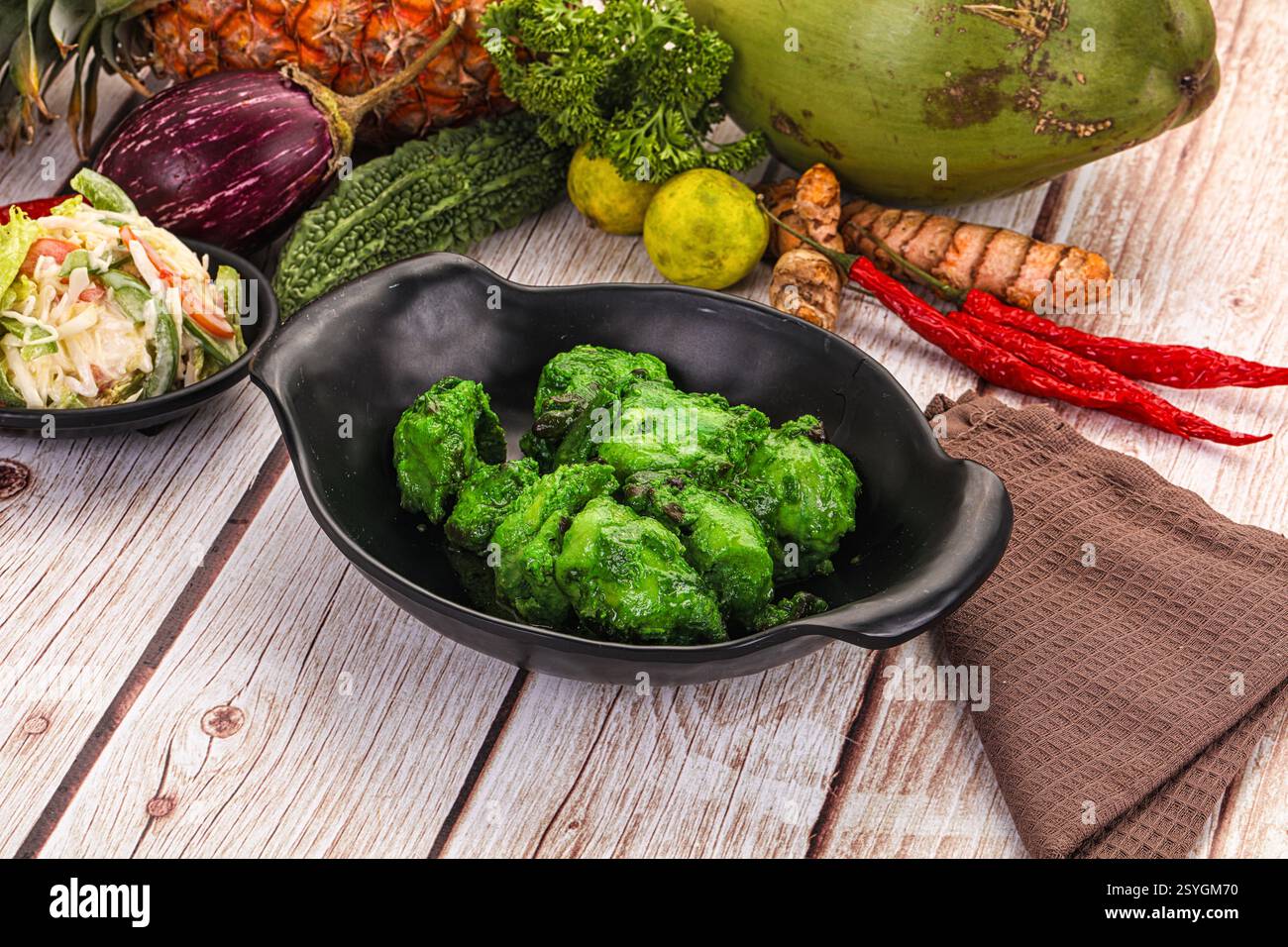 Indian green chicken mint tikka barbecue Stock Photo - Alamy