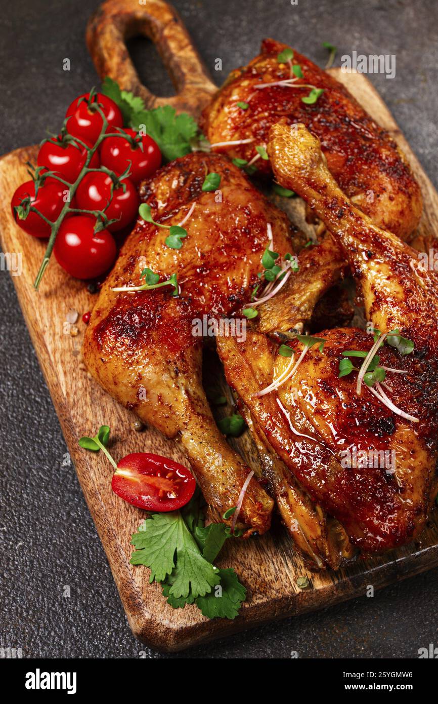 Freshly roasted chicken legs hi-res stock photography and images - Alamy