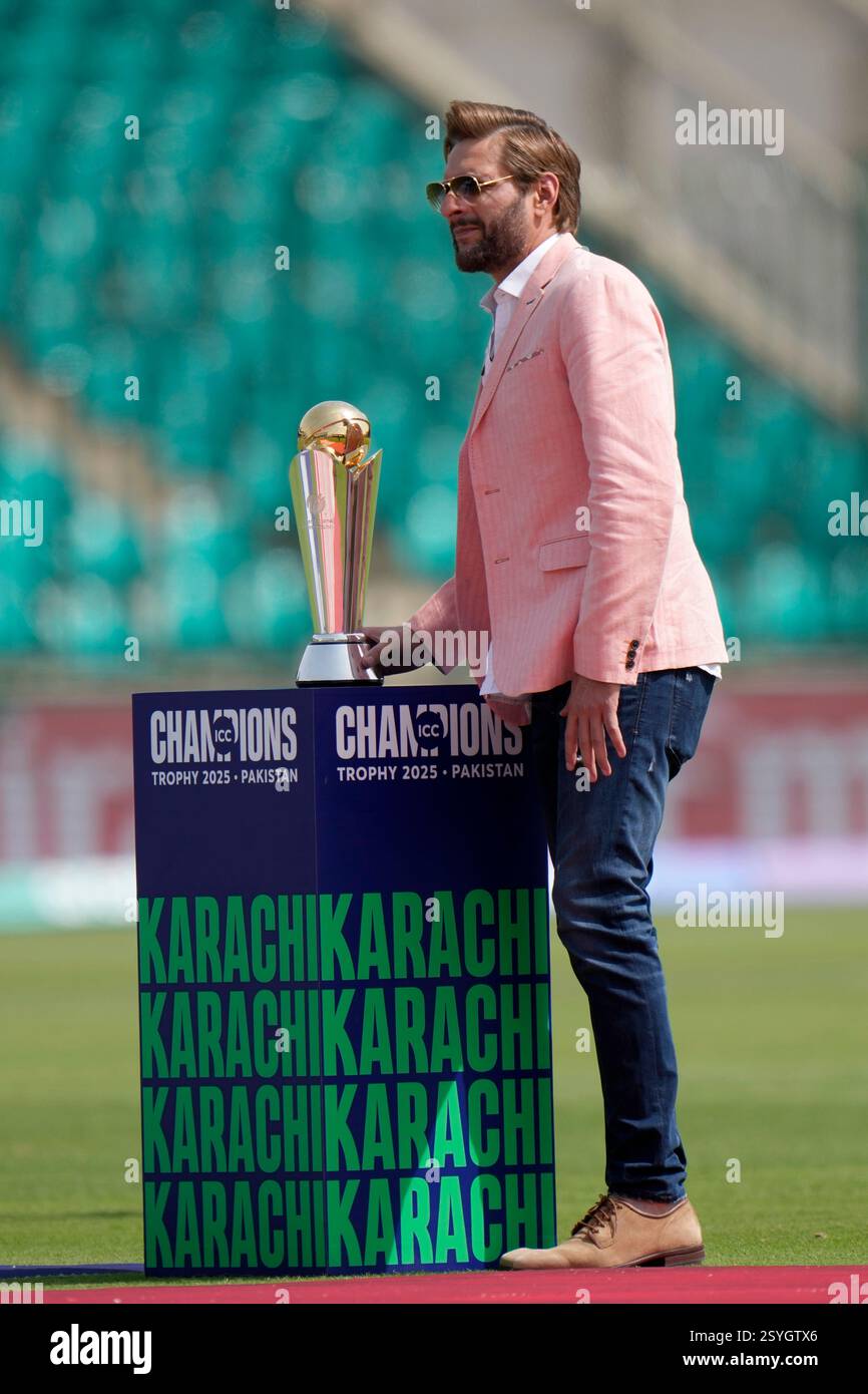 Pakistan's former cricketer Shahid Afridi displays the trophy before ...