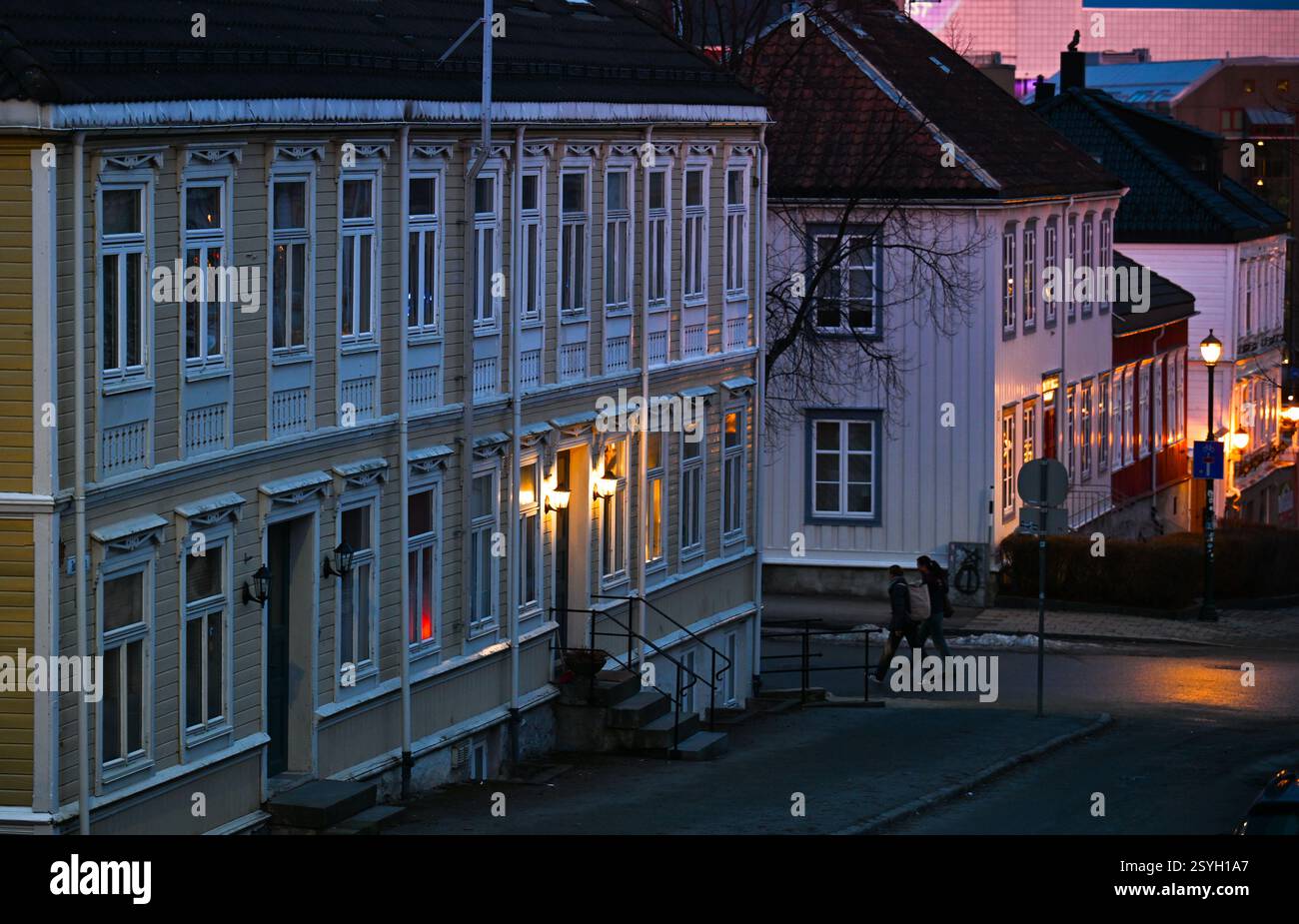 28 February 2025, Norway, Trondheim: Wooden houses characterize a ...