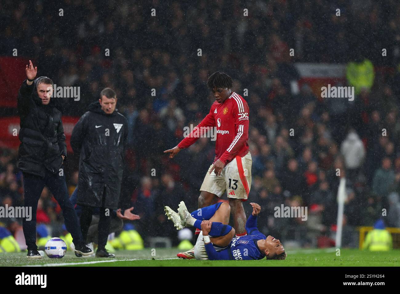 Patrick Dorgu of Manchester United fouls Omari Hutchinson of Ipswich ...
