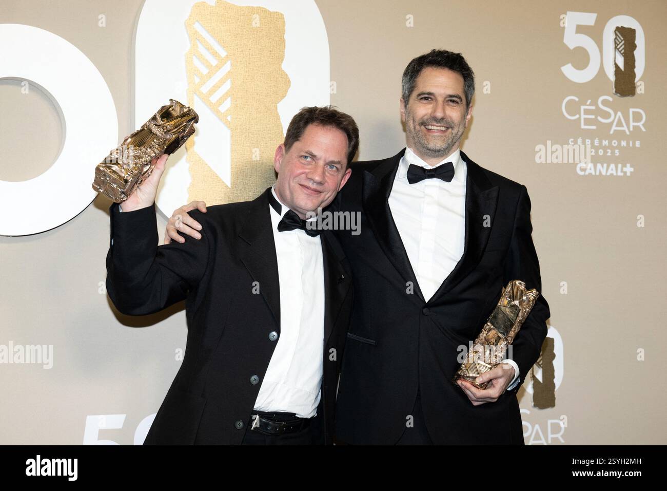 Ron Dyens and Gregory Zalcman pose in the winners room with the Best ...