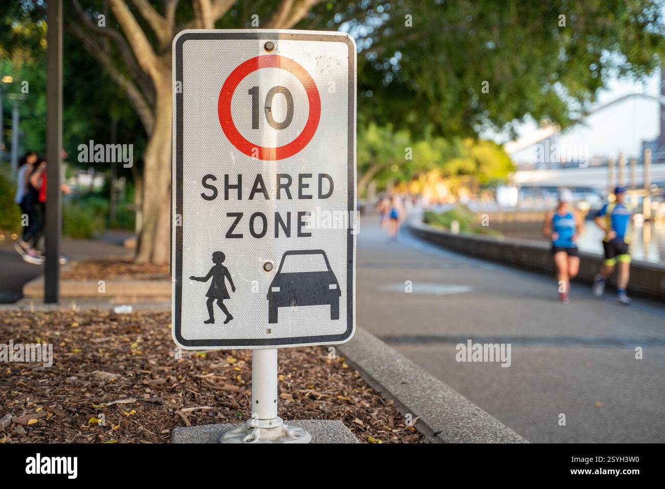 Shared pedestrian and car zone speed limit warning road sign Stock ...