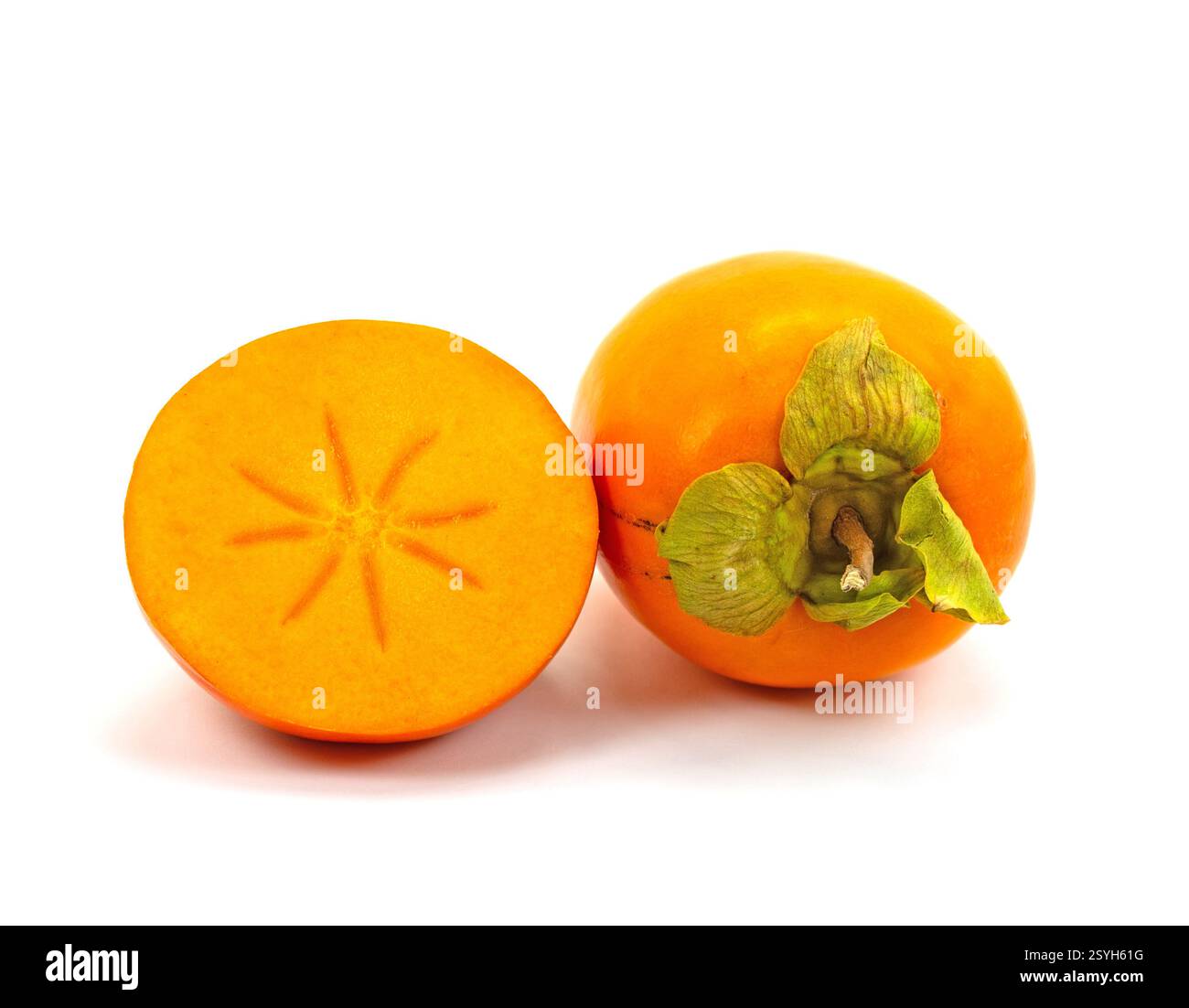 Persimmons, sharon fruit, against a white background Stock Photo - Alamy