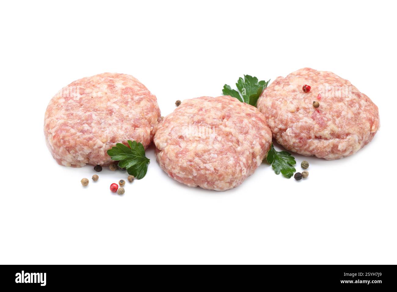 Three uncooked patties and spices isolated on white Stock Photo - Alamy