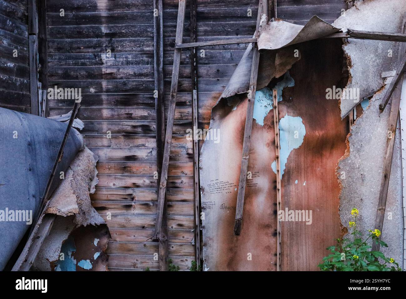 Interior of an abandoned dilapidated wooden shack house at Paragkes ...