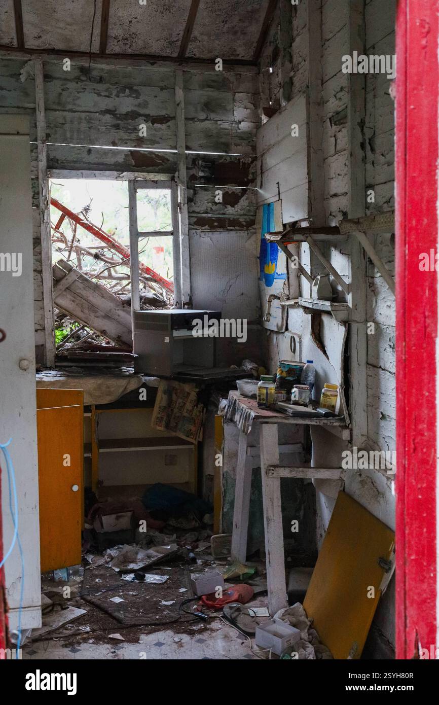 Vouliagmeni, Greece - February 28, 2025. Interior of an abandoned ...