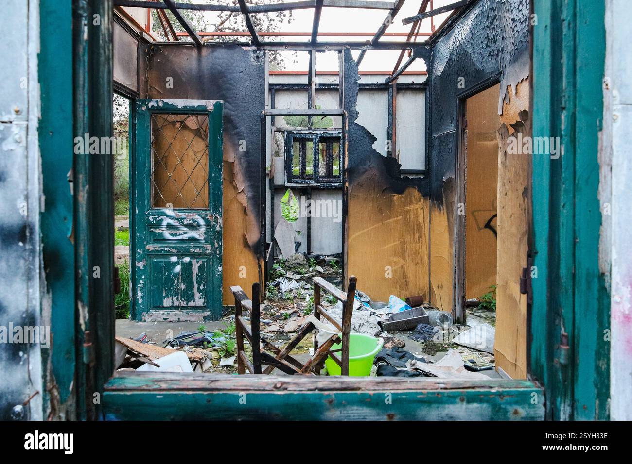 Vouliagmeni, Greece - February 28, 2025. Burned, destroyed interior of ...