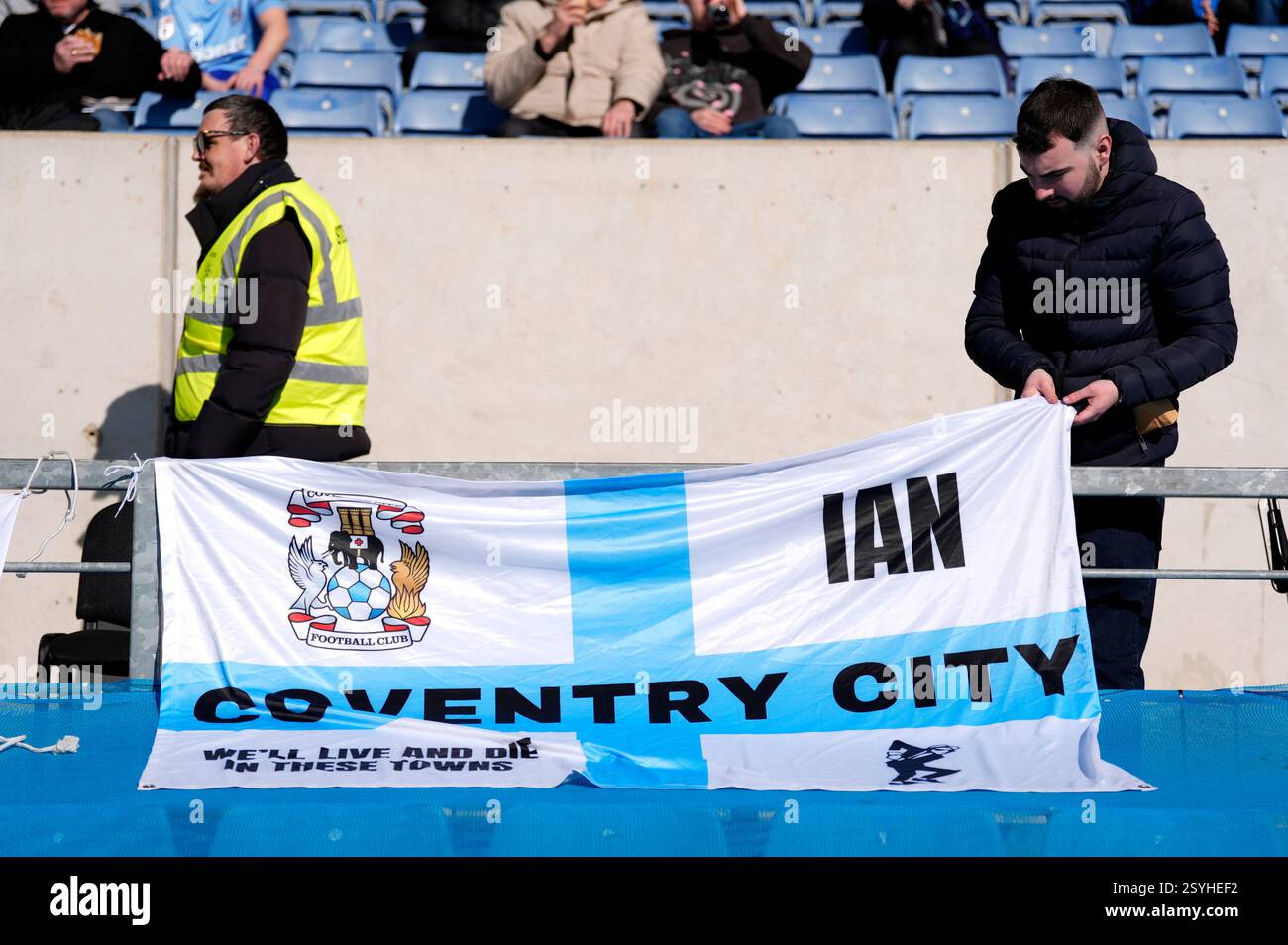 Coventry City fan sets up a flag before the Sky Bet Championship match ...