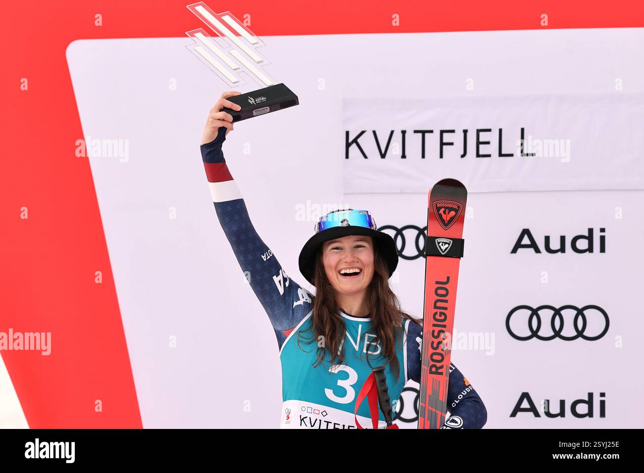 United States' Lauren Macuga celebrates on the podium after taking ...