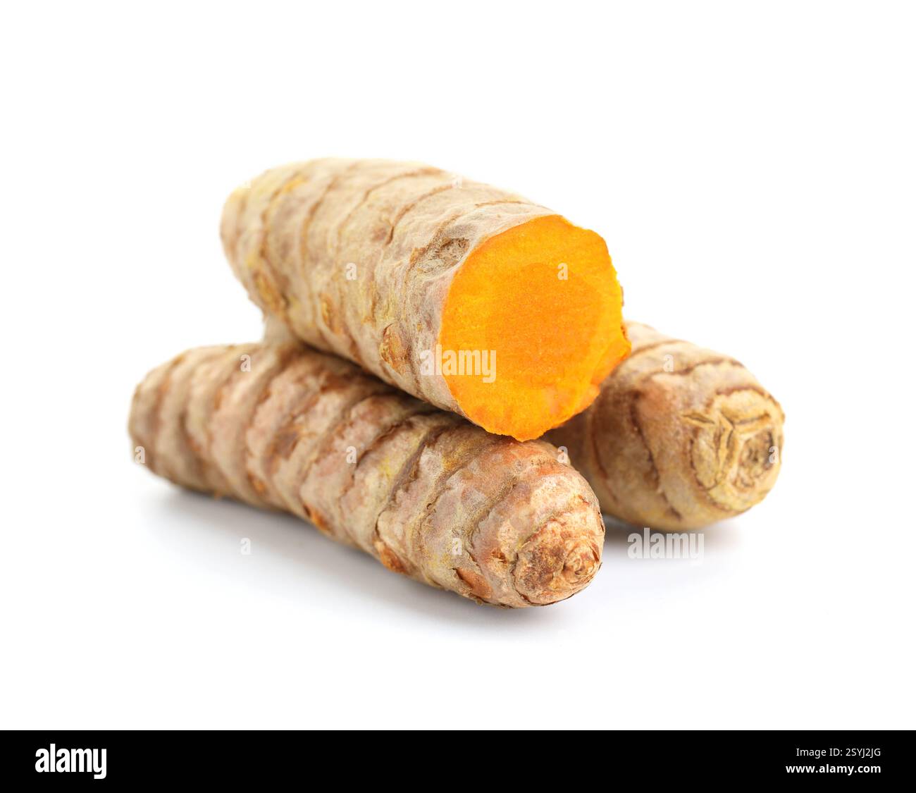 Whole and cut turmeric roots isolated on white Stock Photo - Alamy