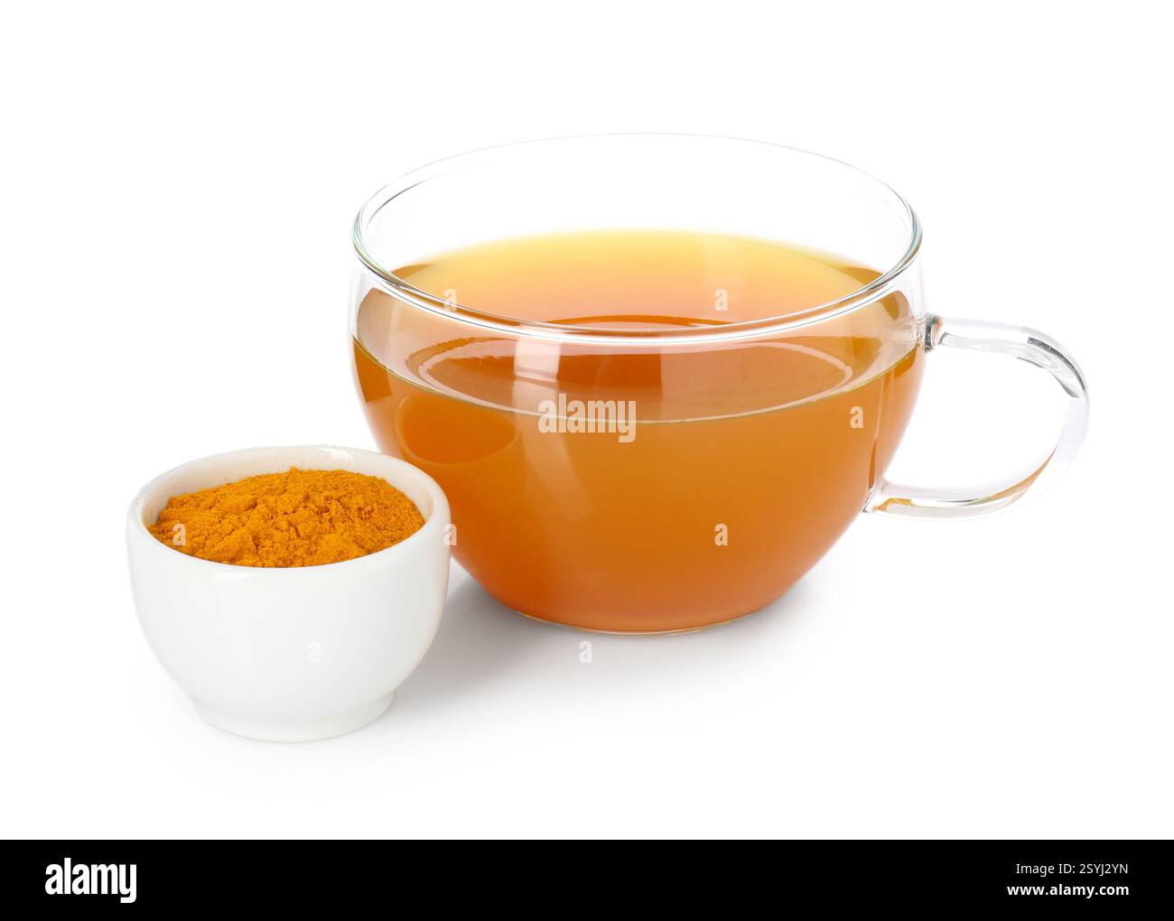 Aromatic turmeric tea in glass cup and powder isolated on white Stock ...