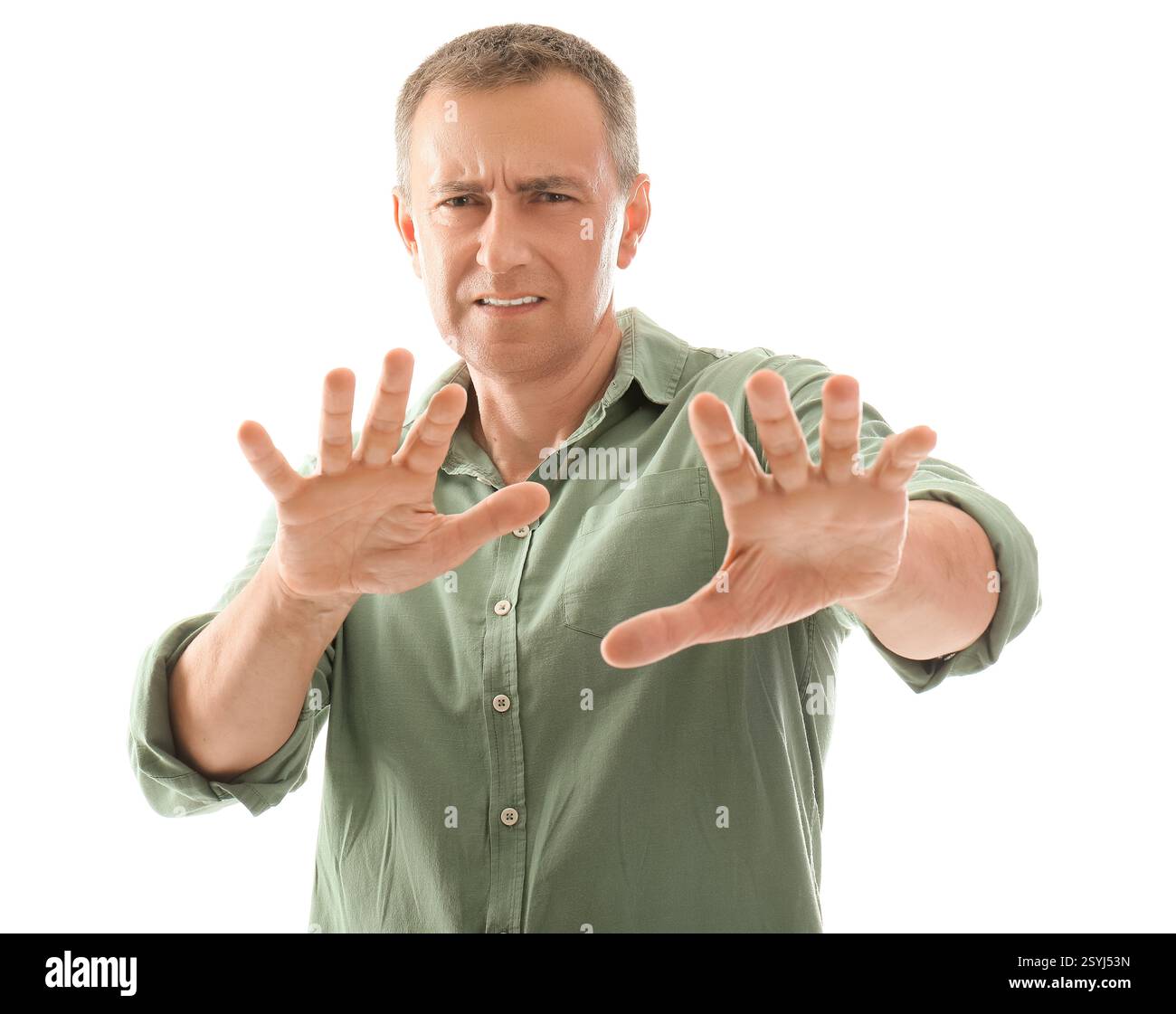 Portrait of displeased mature man rejecting something on white ...