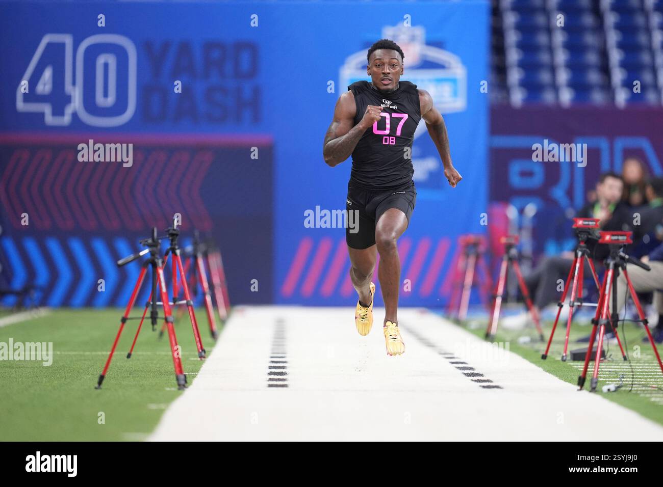 Kansas defensive back Mello Dotson runs the 40-yard dash at the NFL ...