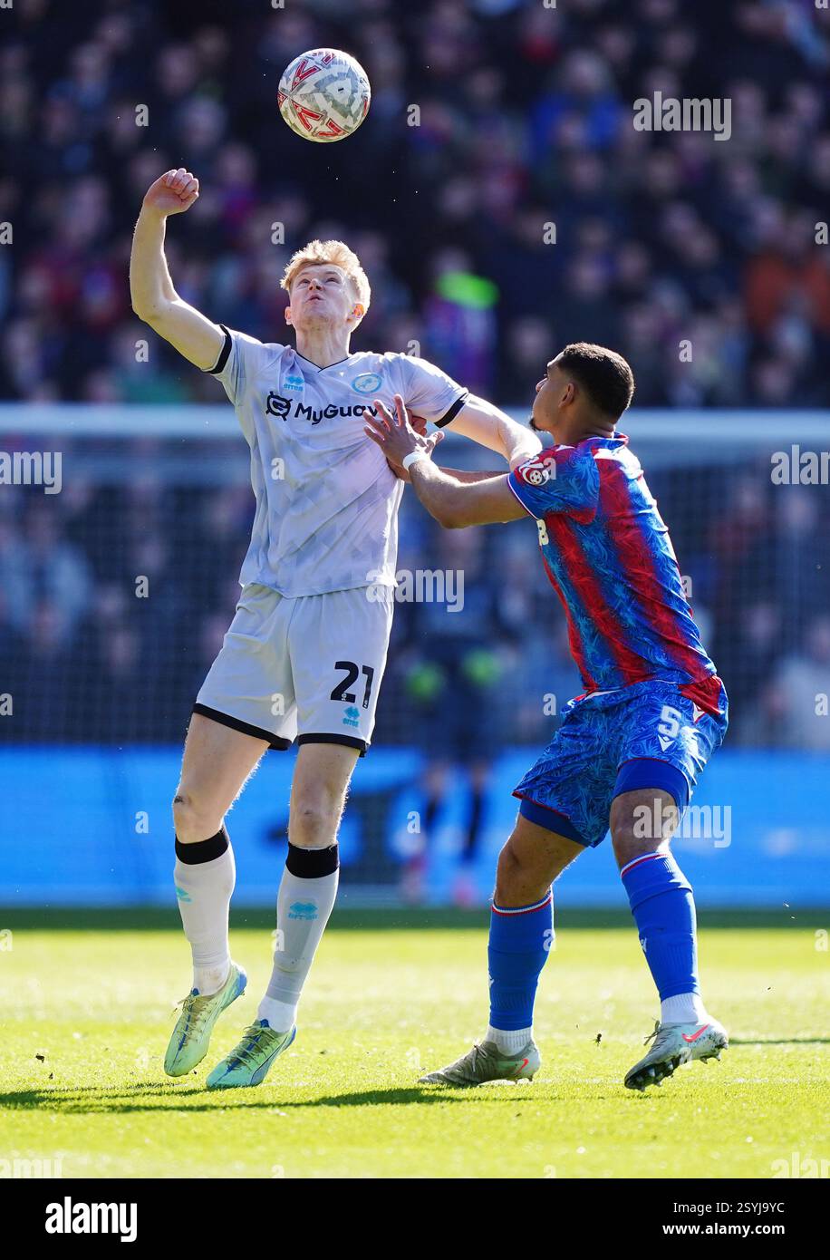 Millwall's Josh Coburn and Crystal Palace's Maxence Lacroix (right ...