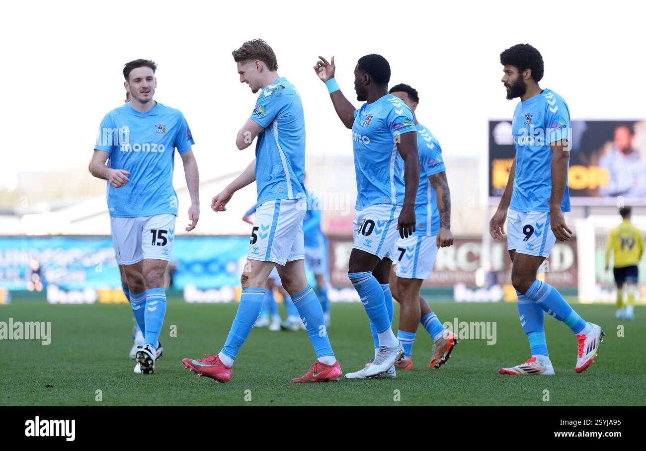Coventry City's Jack Rudoni (second left) celebrates scoring their side ...