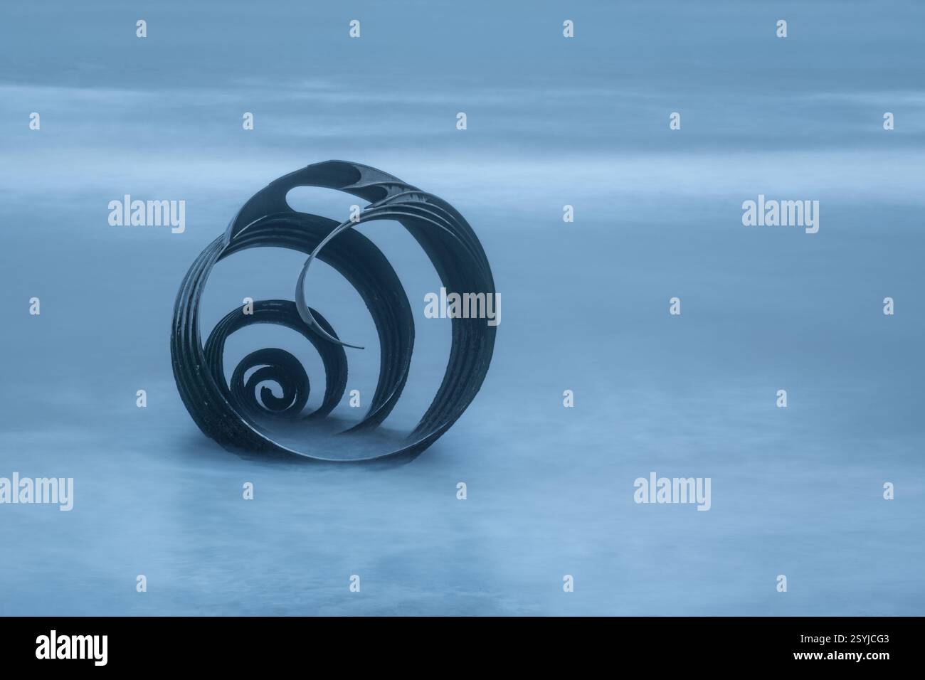 Metal shell sculpture on Lancashire beach, shaped by tides and time as ...