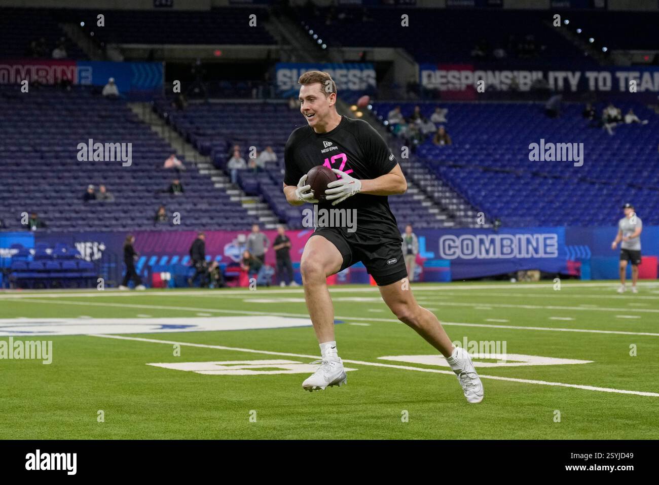 Texas tight end Gunnar Helm runs a drill at the NFL football scouting ...