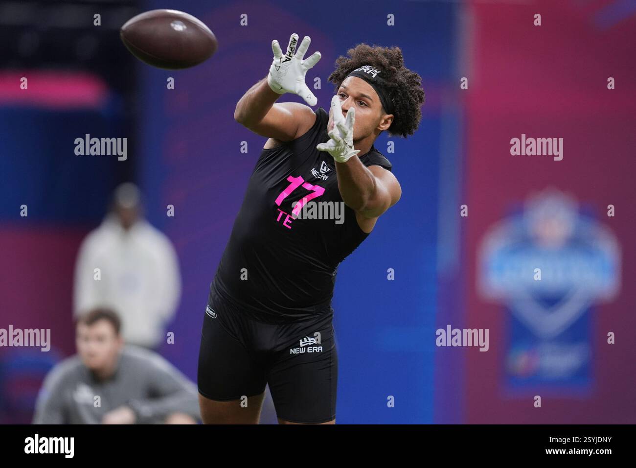 North Carolina tight end Bryson Nesbit runs a drill at the NFL football ...