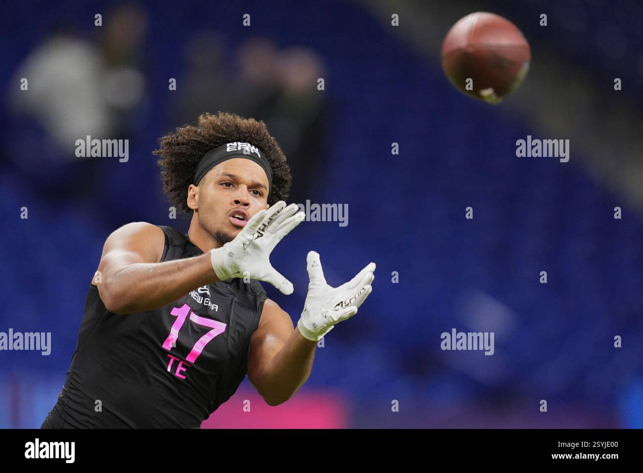 North Carolina tight end Bryson Nesbit runs a drill at the NFL football ...