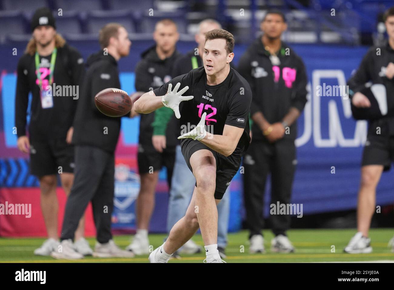 Texas tight end Gunnar Helm runs a drill at the NFL football scouting ...