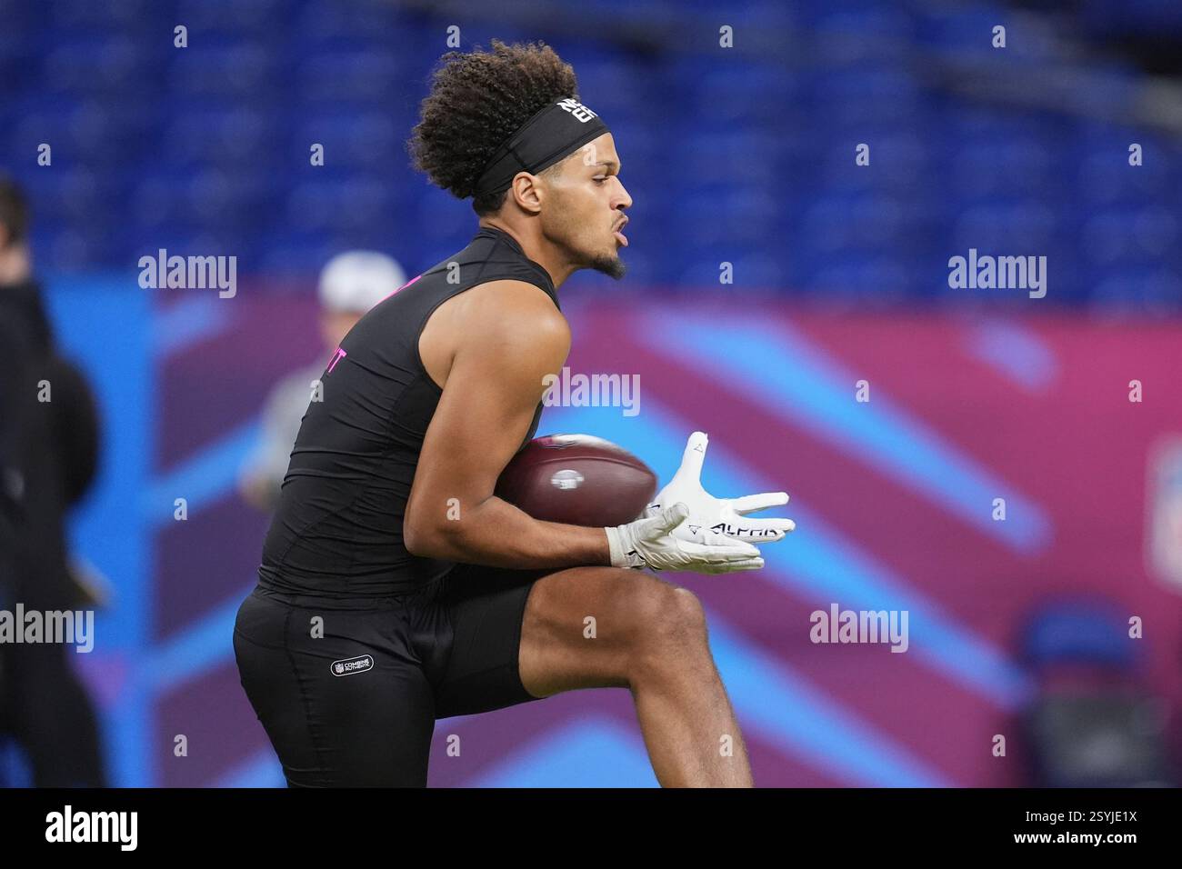 North Carolina tight end Bryson Nesbit runs a drill at the NFL football ...