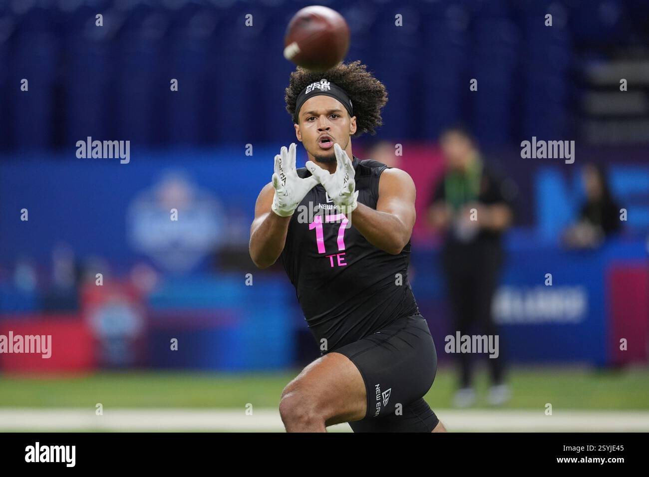 North Carolina tight end Bryson Nesbit runs a drill at the NFL football ...