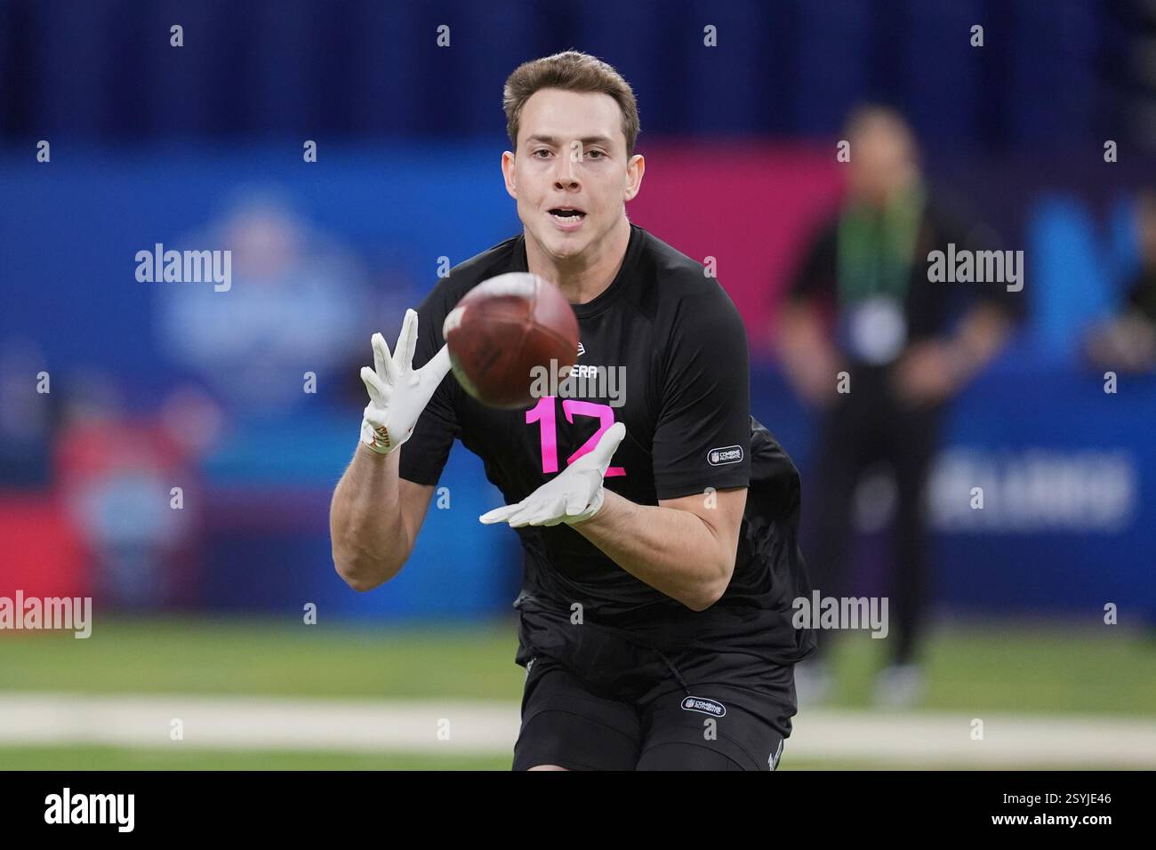 Texas tight end Gunnar Helm runs a drill at the NFL football scouting ...