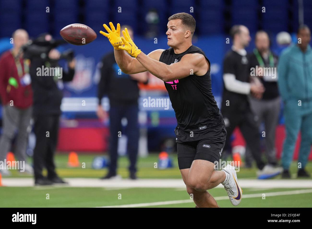 LSU tight end Mason Taylor runs a drill at the NFL football scouting ...