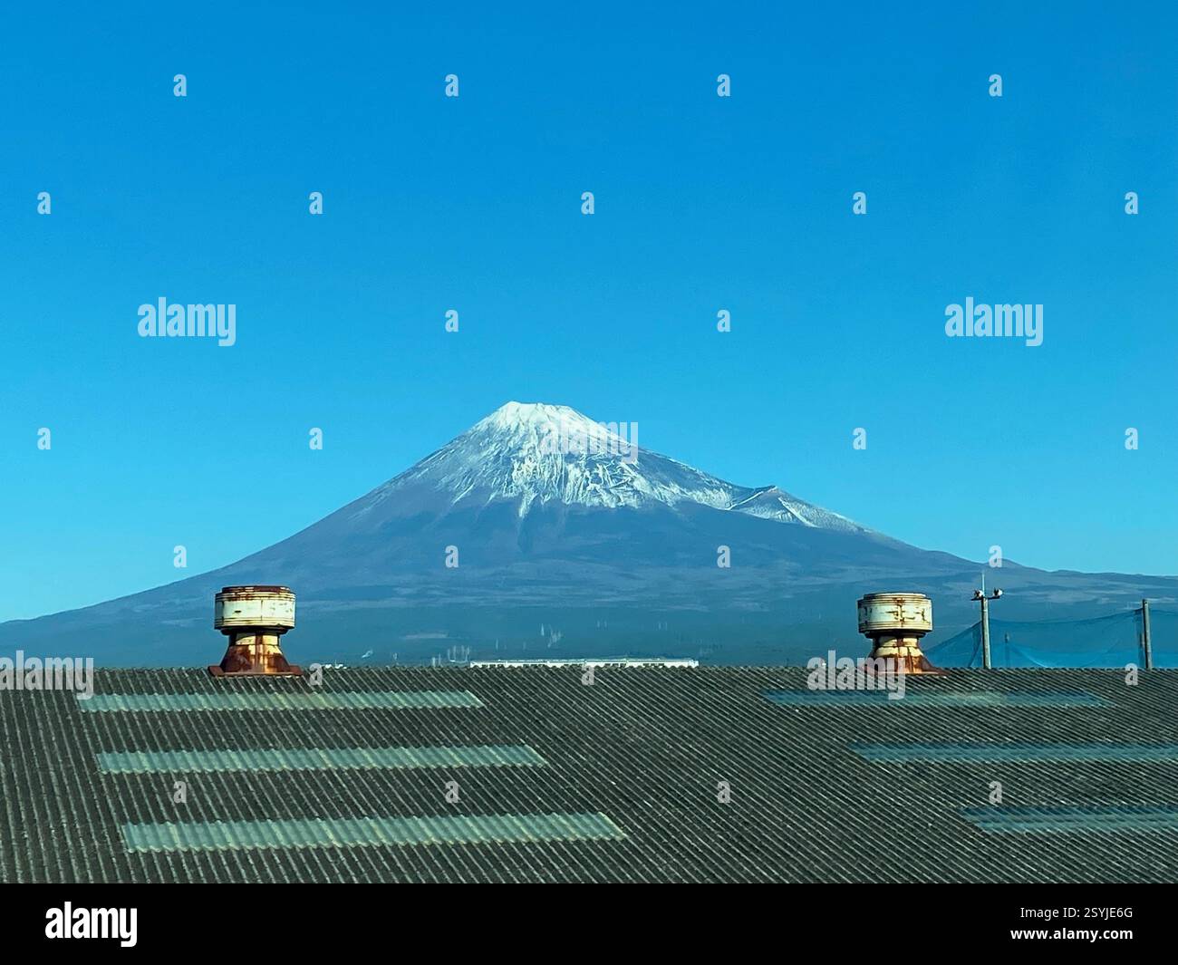 Landscape with panoramic view of Mount Fuji as seen from the bullet train JR San'yo Shinkansen ...