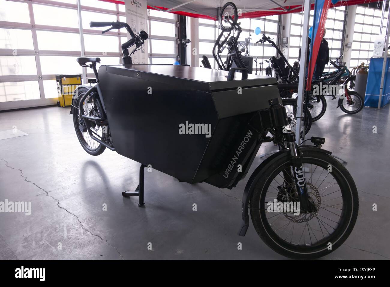 Urban Arrow cargo bike with a closed transport box for electrically ...