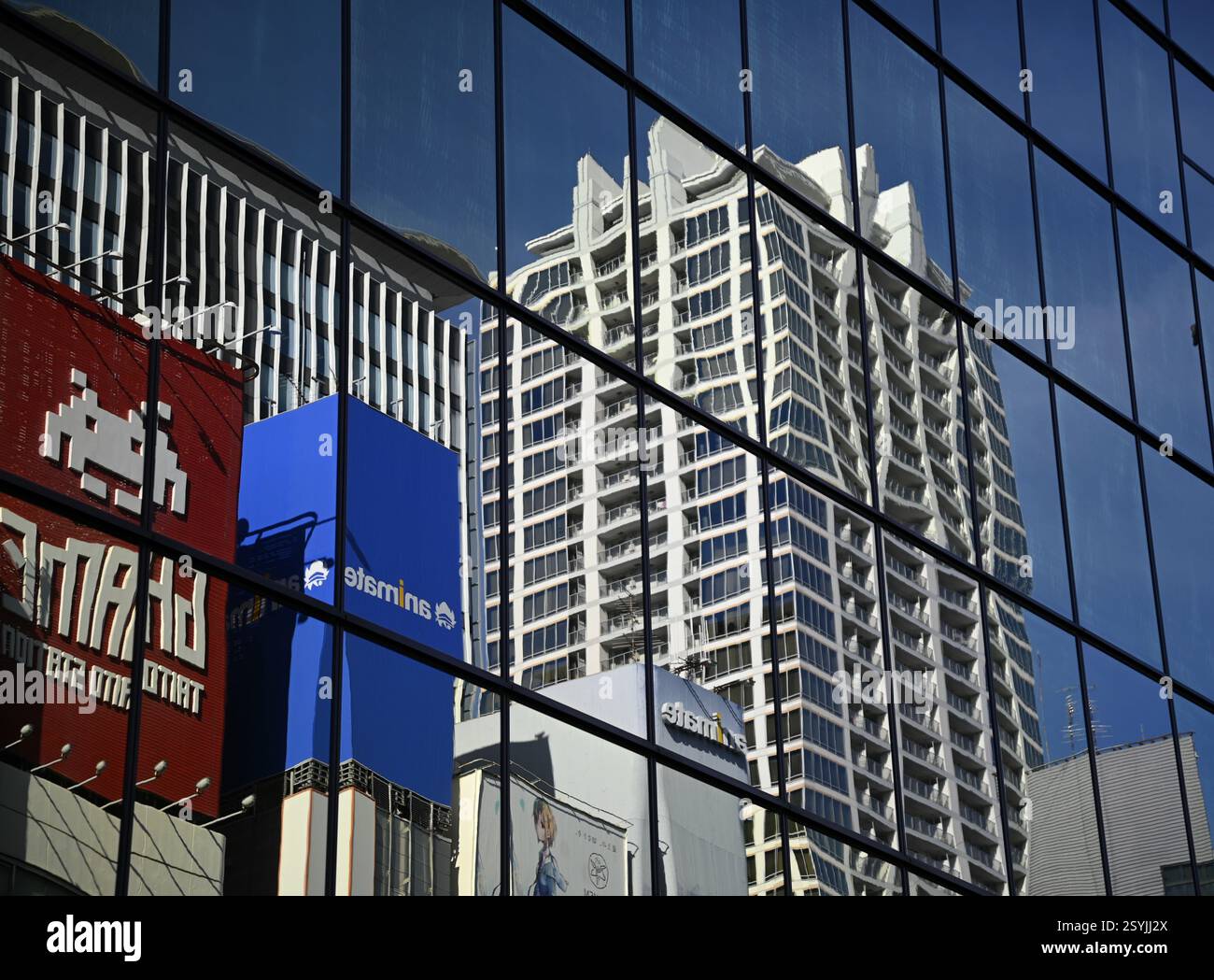 Skyscrapers reflection in Akihabara Denki Gai the center of Otaku ...