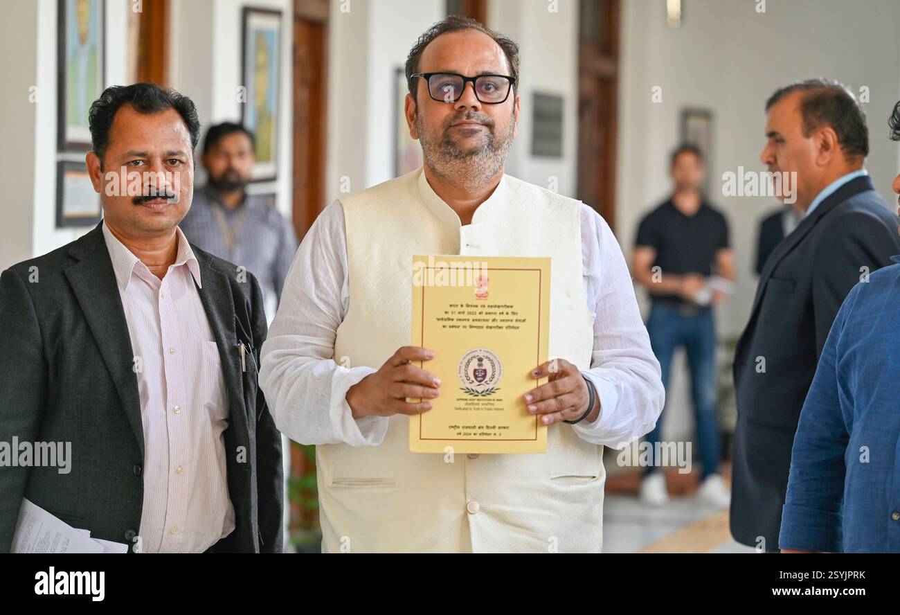 NEW DELHI, INDIA - FEBRUARY 28: Delhi Health Minister Pankaj Kumar Singh with CAG Report Arrive ...