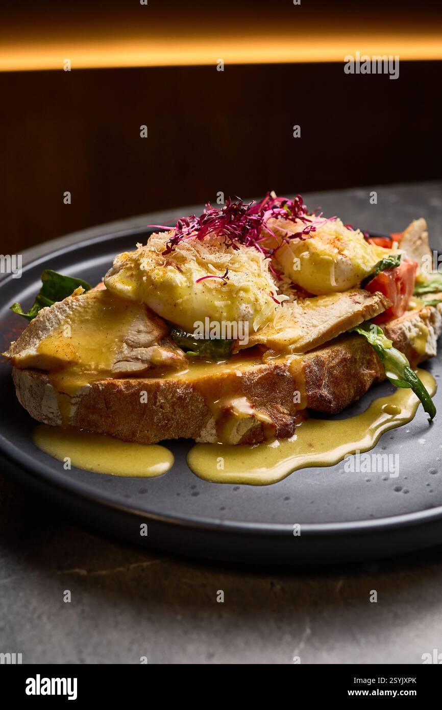 Savory Eggs Benedict featuring Smoked Chicken, Tomato, Rich Sauce ...