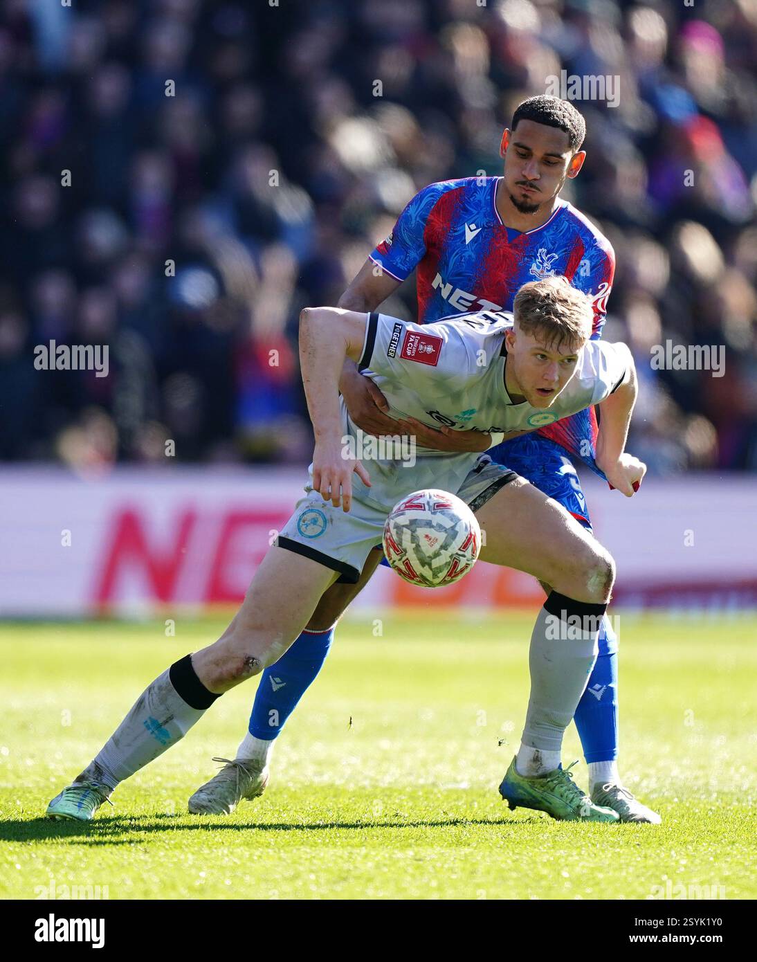 Millwall's Josh Coburn and Crystal Palace's Daniel Munoz battle for the ...