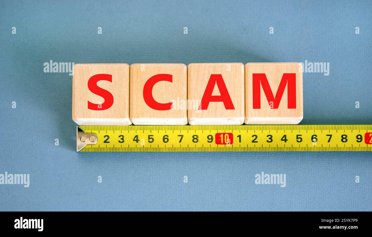 Scam symbol. Concept word Scam on beautiful wooden blocks. Beautiful ...