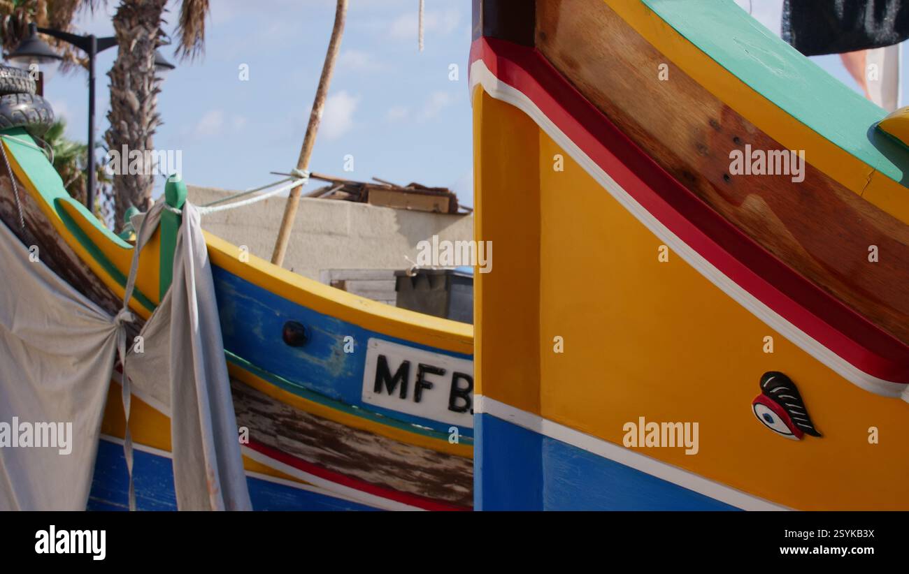 Luzzu in the harbour of Marsaxlokk Stock Photo - Alamy