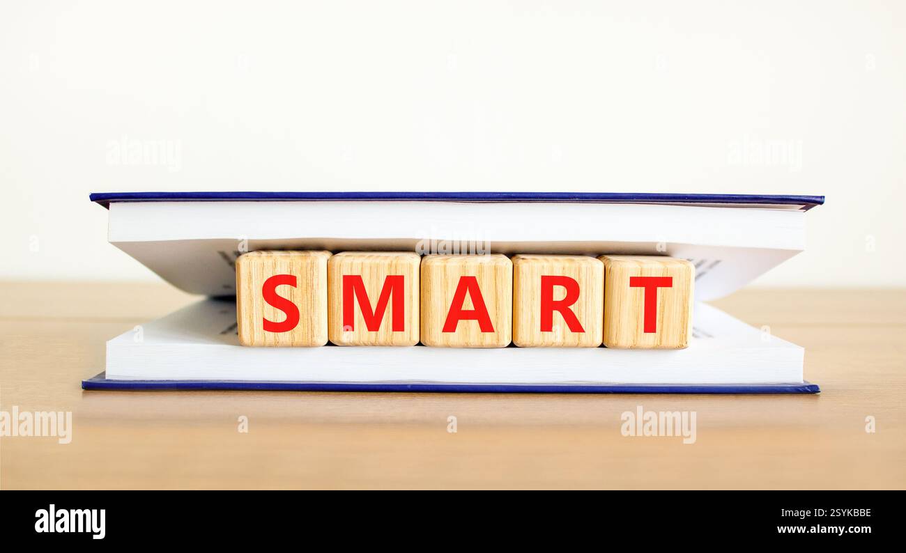 Smart symbol. Concept word Smart on beautiful wooden blocks in book ...