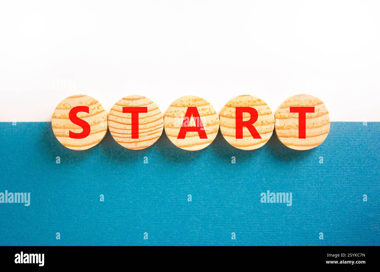 Start symbol. Concept word Start on beautiful wooden circles. Beautiful ...