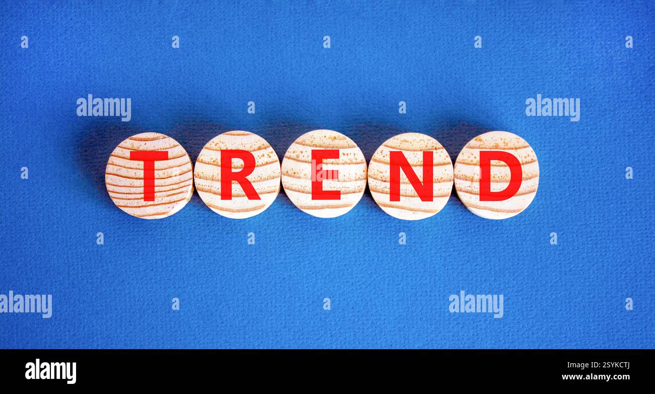 Trend and trending symbol. Concept word Trend on beautiful wooden ...