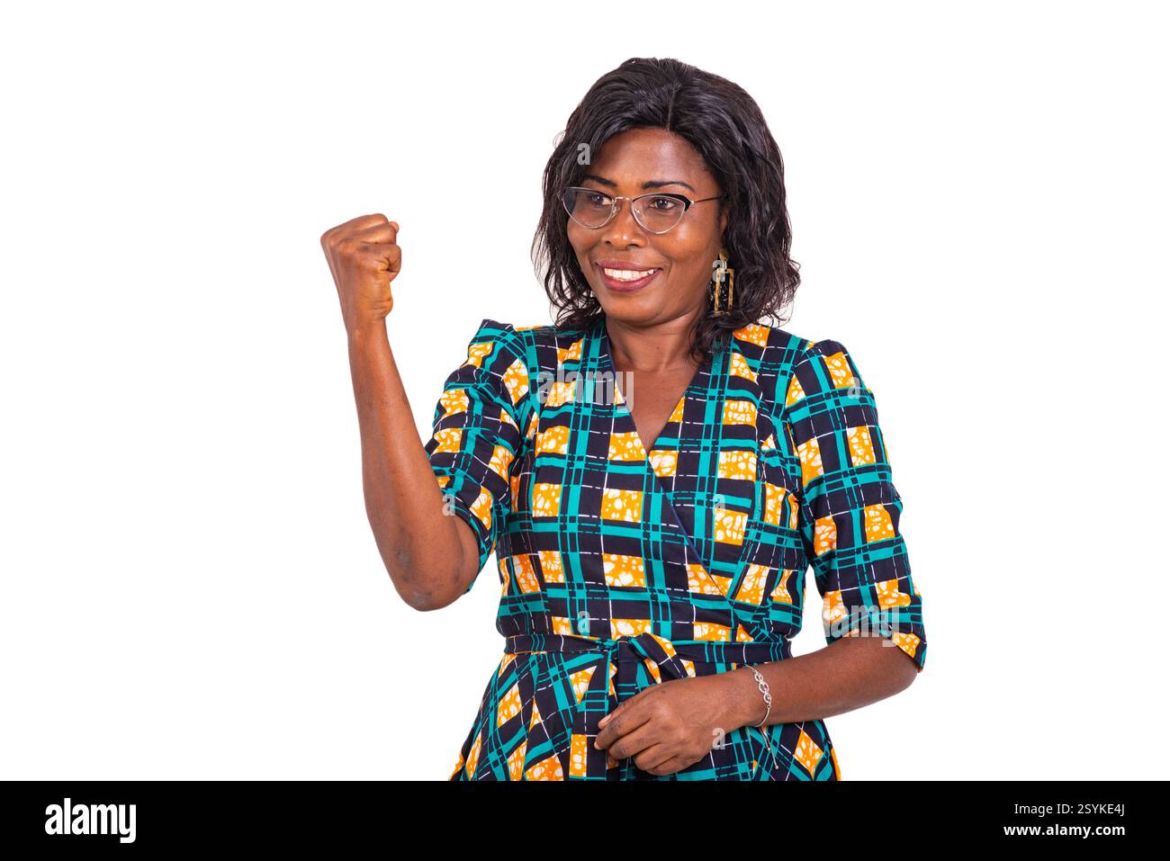 beautiful happy adult business woman making winning gesture with raised ...